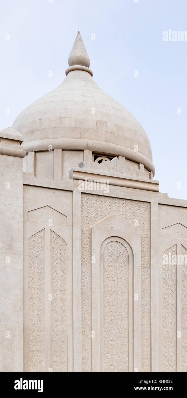 Fragment of an ancient Muslim mosque of white stone Stock Photo - Alamy