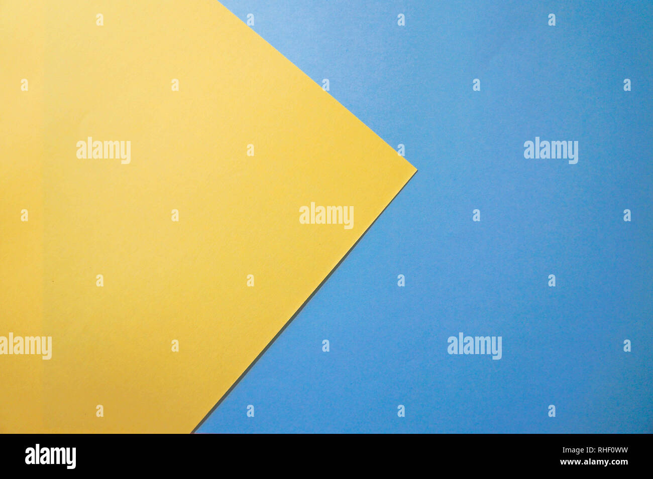 Pastel paper background for design. Yellow and blue Stock Photo - Alamy