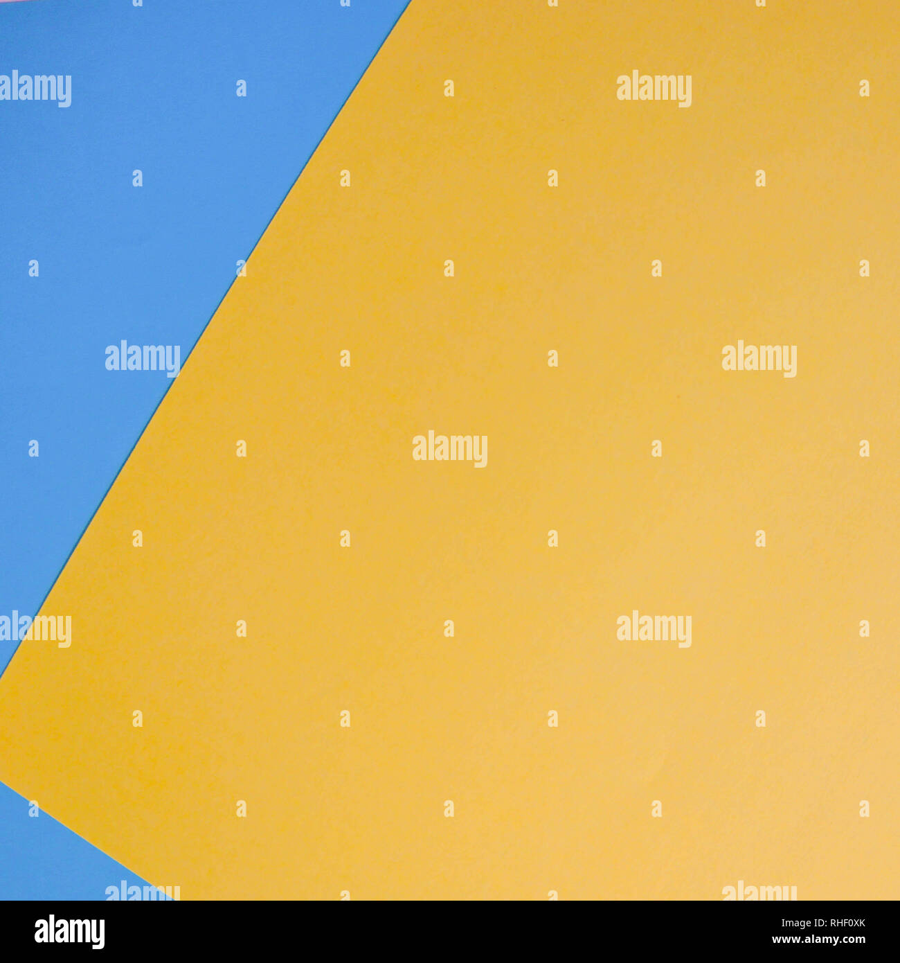 Bright paper background for design. Blue and yellow Stock Photo - Alamy