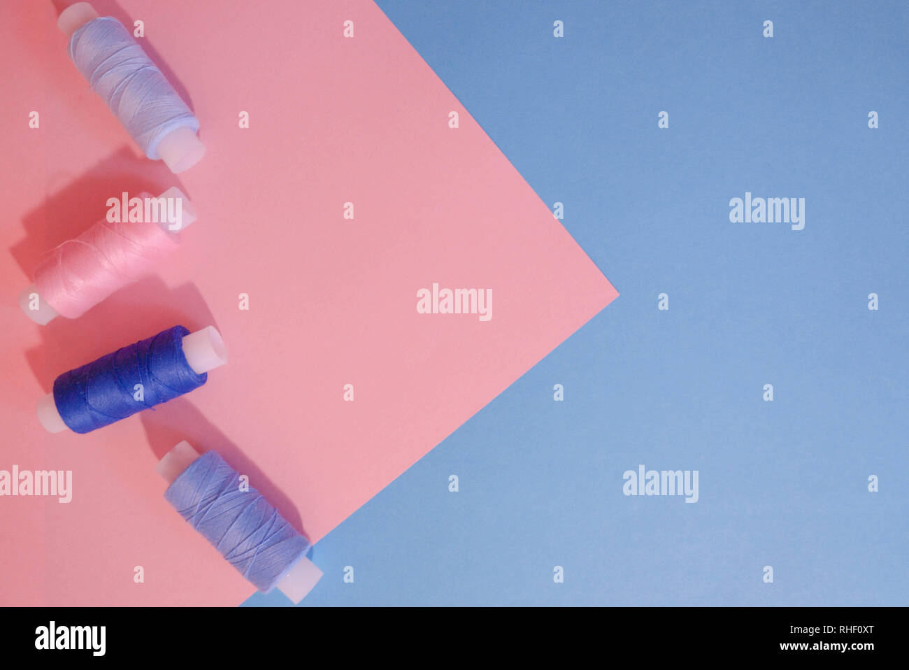 Pastel paper background with threads for design Stock Photo - Alamy