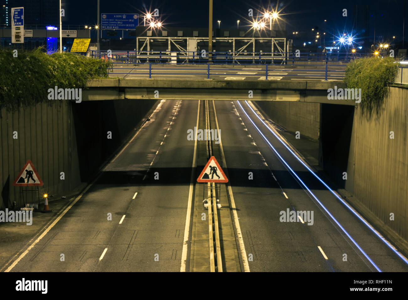 A long exposure of a motorway in Birmingham, England. Two construction ...