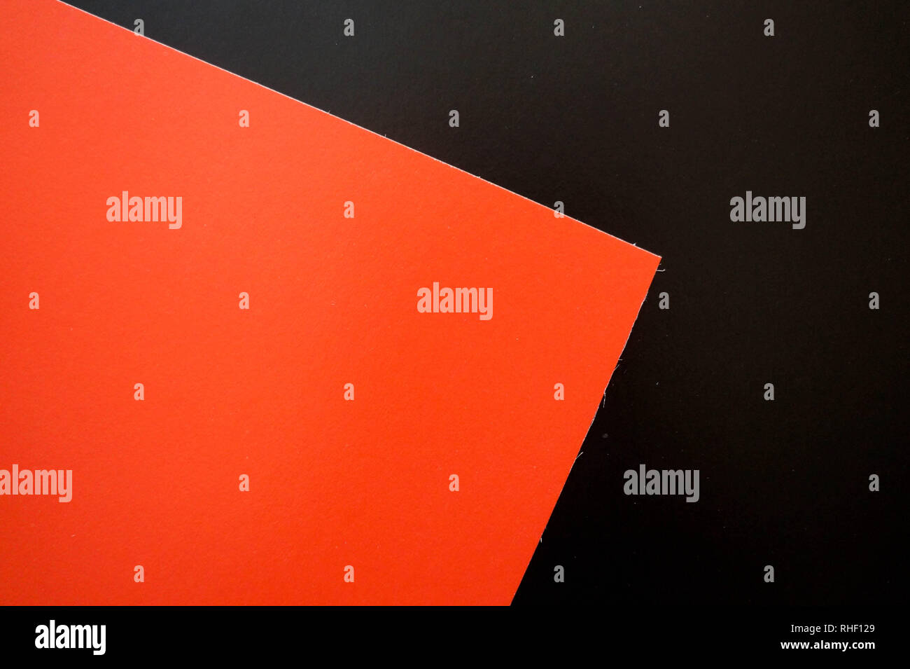 Dark flat lay background with color paper sheets. Black and red Stock ...