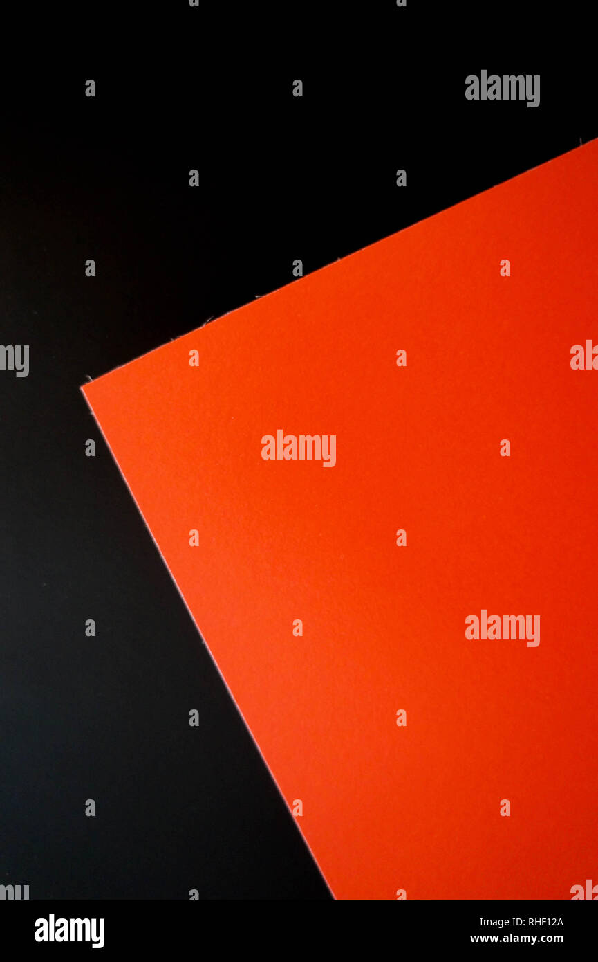 Dark flat lay background with color paper sheets. Black and red Stock ...