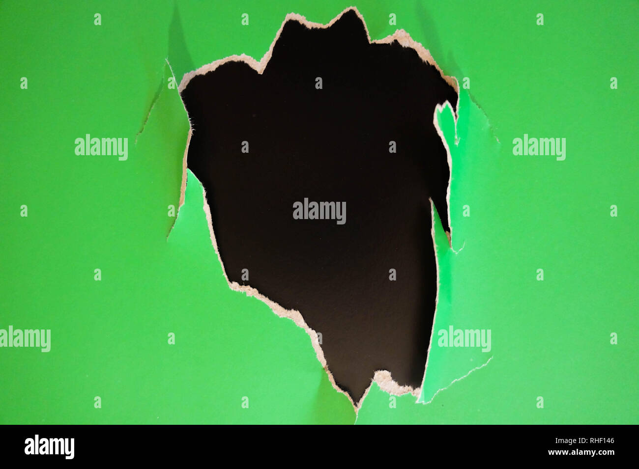 Unique flat lay background with color fragmentary paper. Green and ...