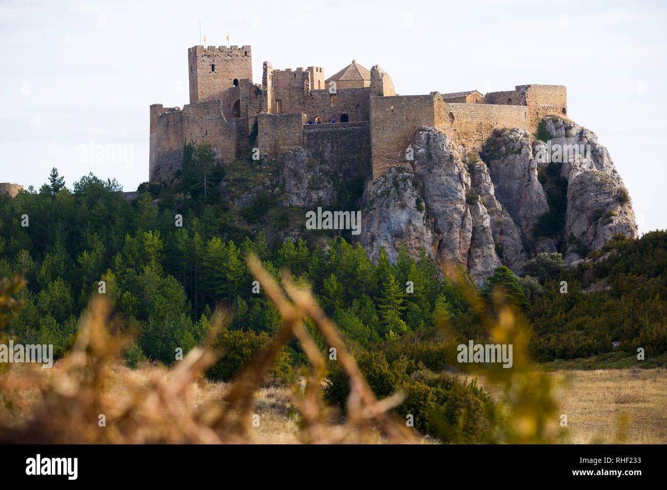 View of impressive medieval castle of Loarre on mountainside, Spain ...