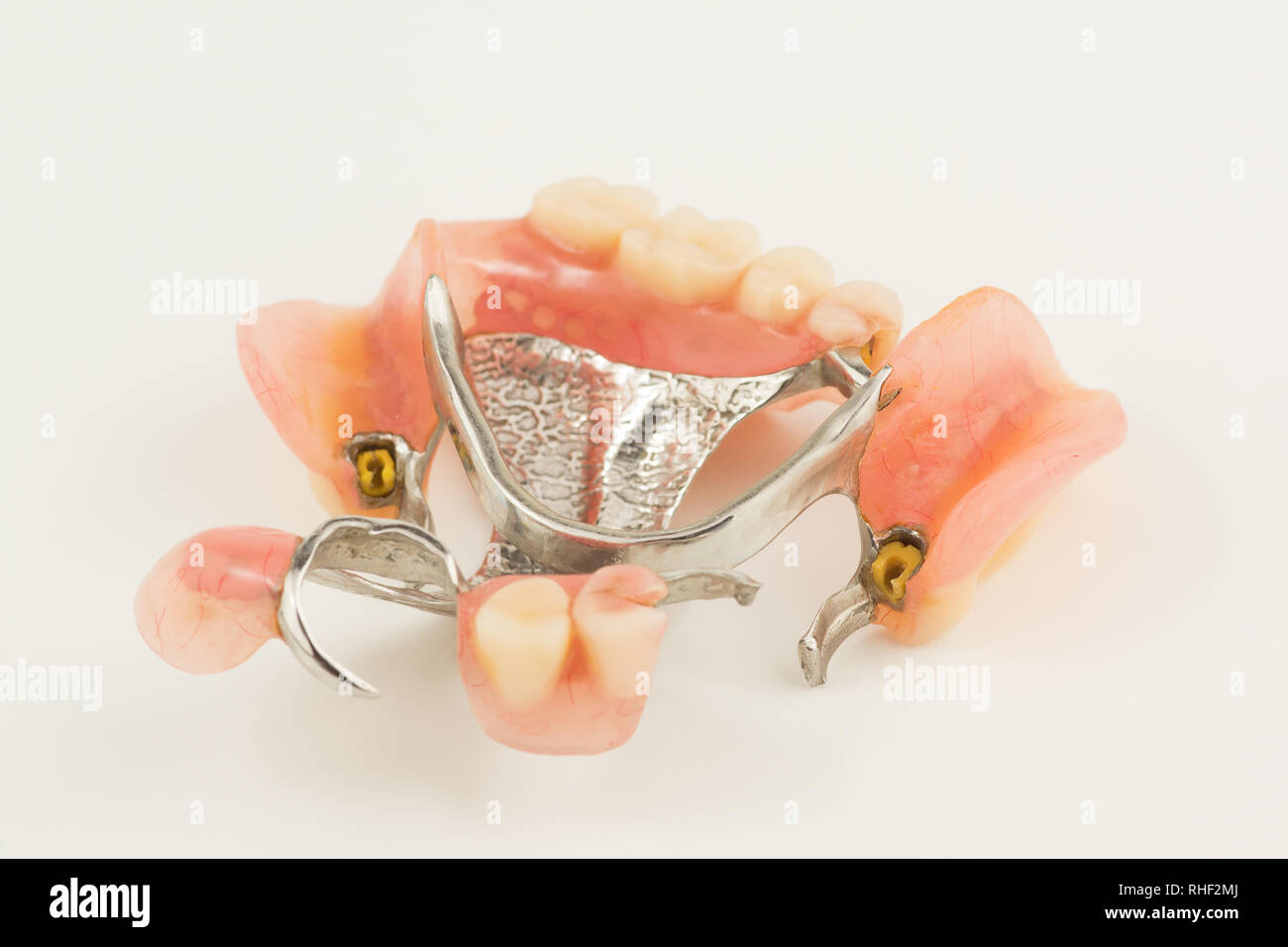 bugel remove dentures with attachments on white background Stock Photo ...