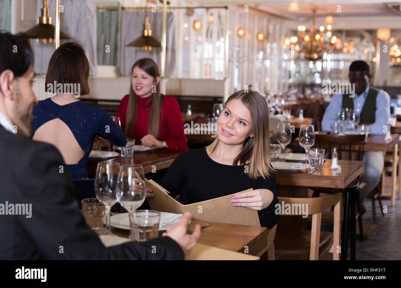 Lovely couple is dining together in luxurious restaurant Stock Photo ...