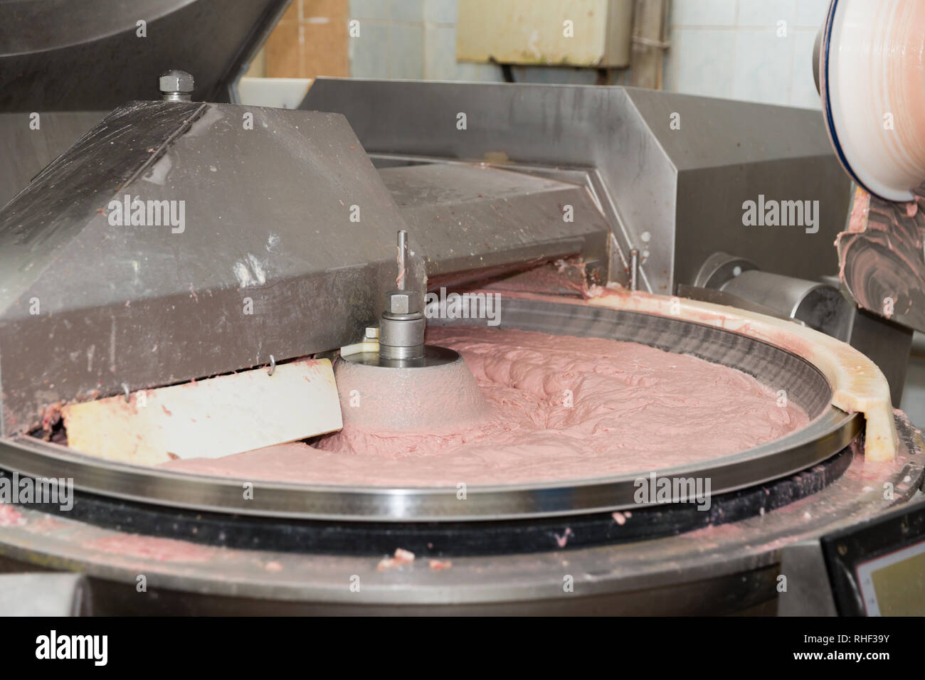 Process of making finely ground meat batter in bowl chopper for cooked ...