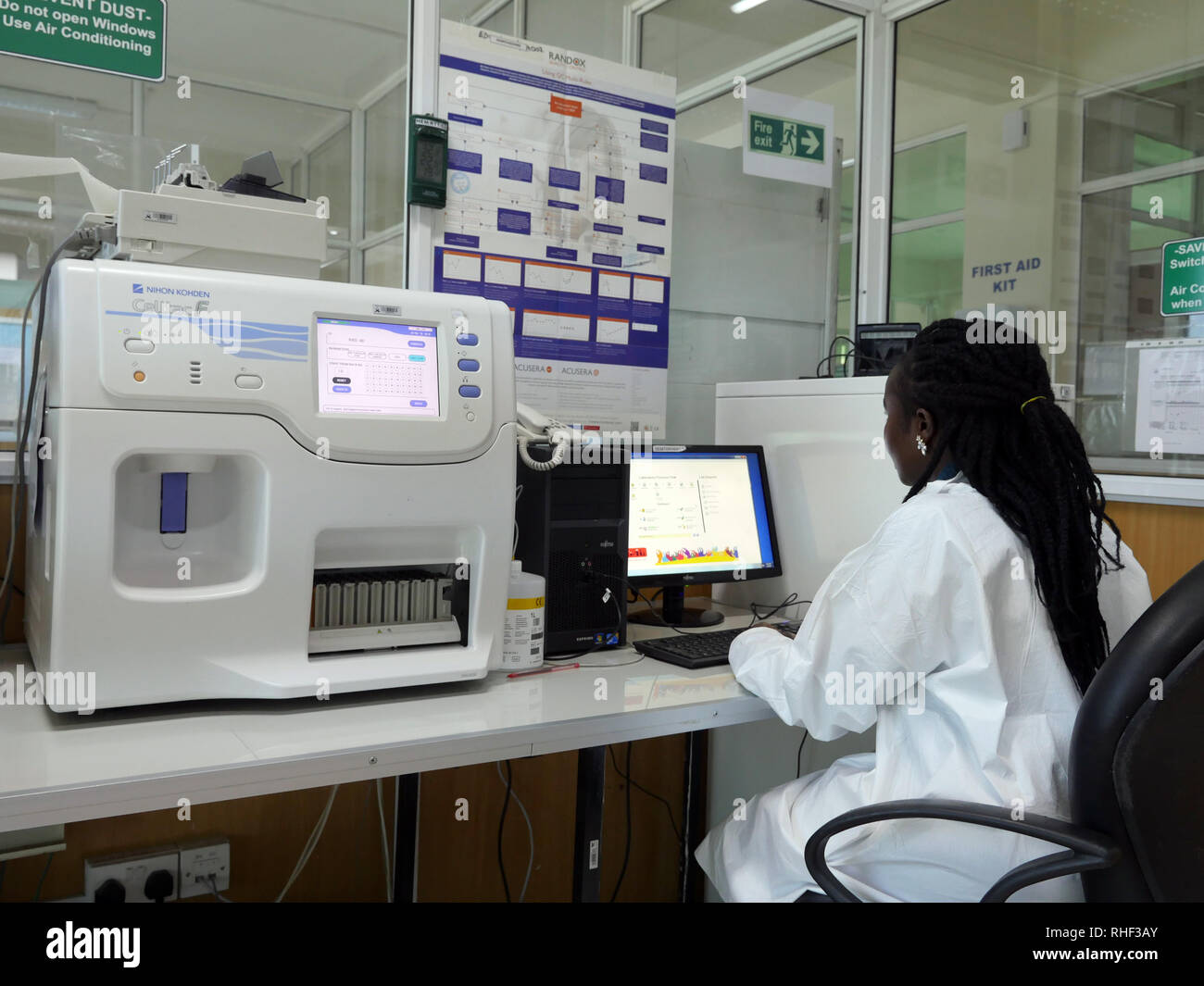 KENYA - photo by Sean Sprague Ann Gacheri, lab technologist, working on ...