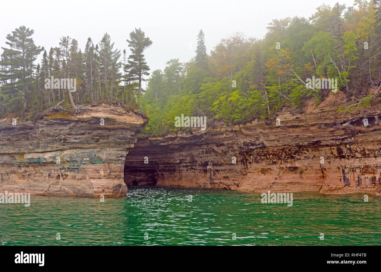 Colorful Cliffs in the Fog on Pictured Rocks National Lakeshore on Lake ...