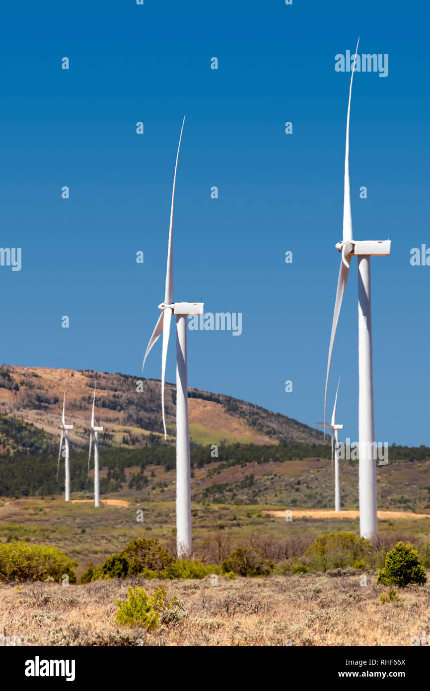 Windmills represent environmentalism and alternative energy, in a field ...