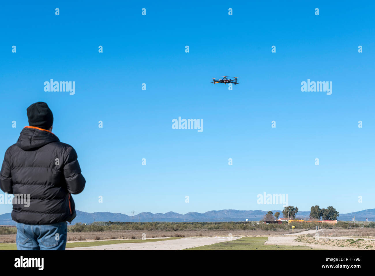 Professional drone flying and remote pilot in the airfield Stock Photo ...
