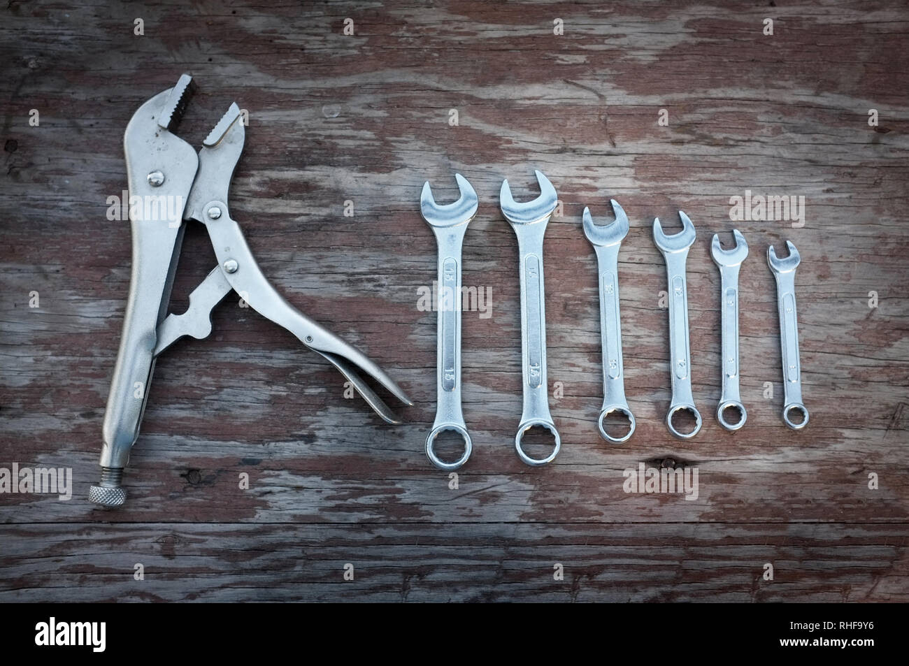 Craftsman tools isolated on wood background Stock Photo - Alamy
