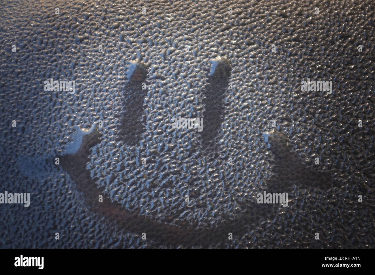 Sad smiley on car glass hi-res stock photography and images - Alamy