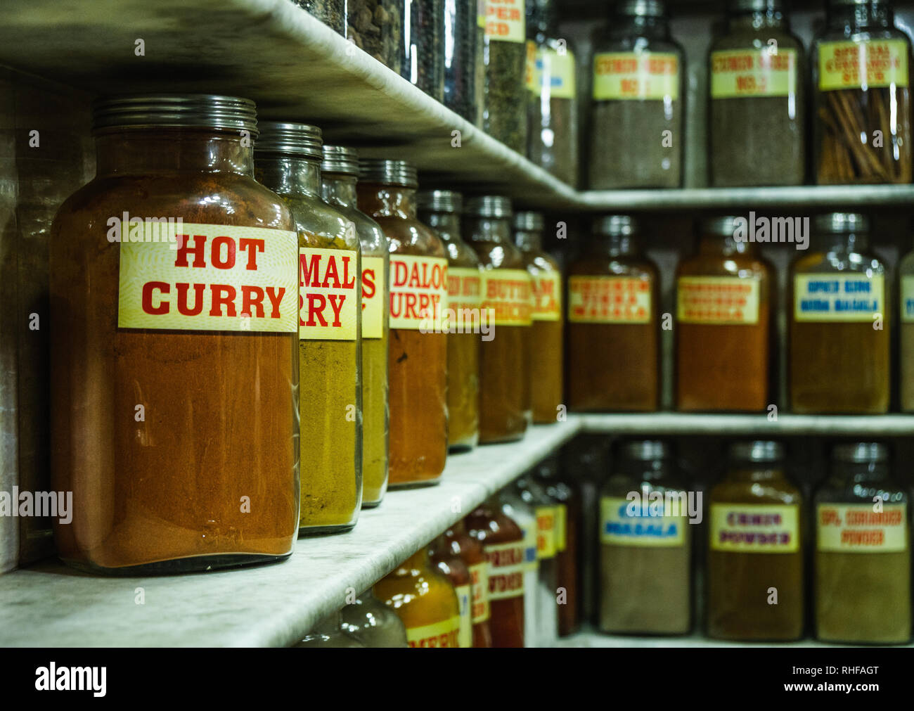 spices jar glass in a shop with hot curry in foreground Stock Photo - Alamy
