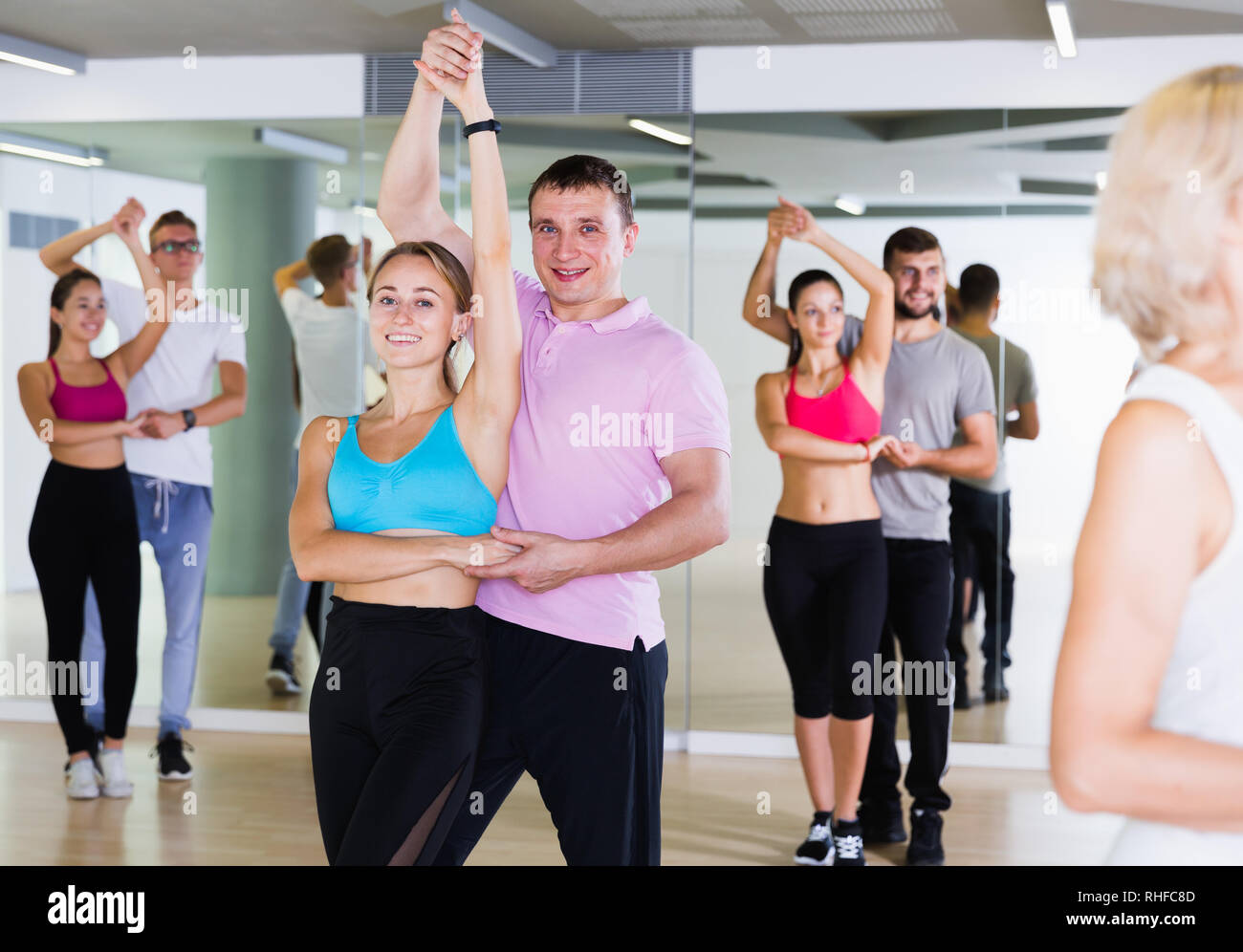 Friendly dancing pair dance together in studio Stock Photo - Alamy