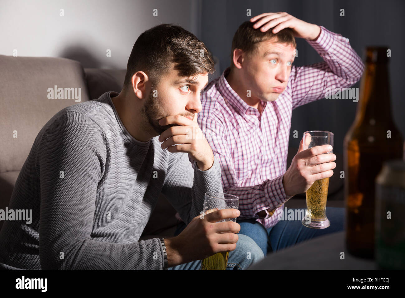 Frustrated man drinking beer hi-res stock photography and images - Alamy