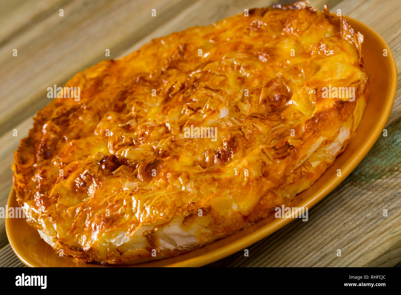 Traditional Bulgarian oven baked filo pie with cheese Banitsa Stock ...