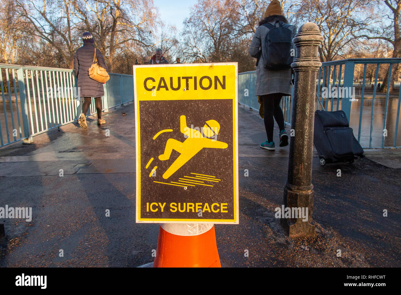 Warning ice slippery surface sign hi-res stock photography and images ...