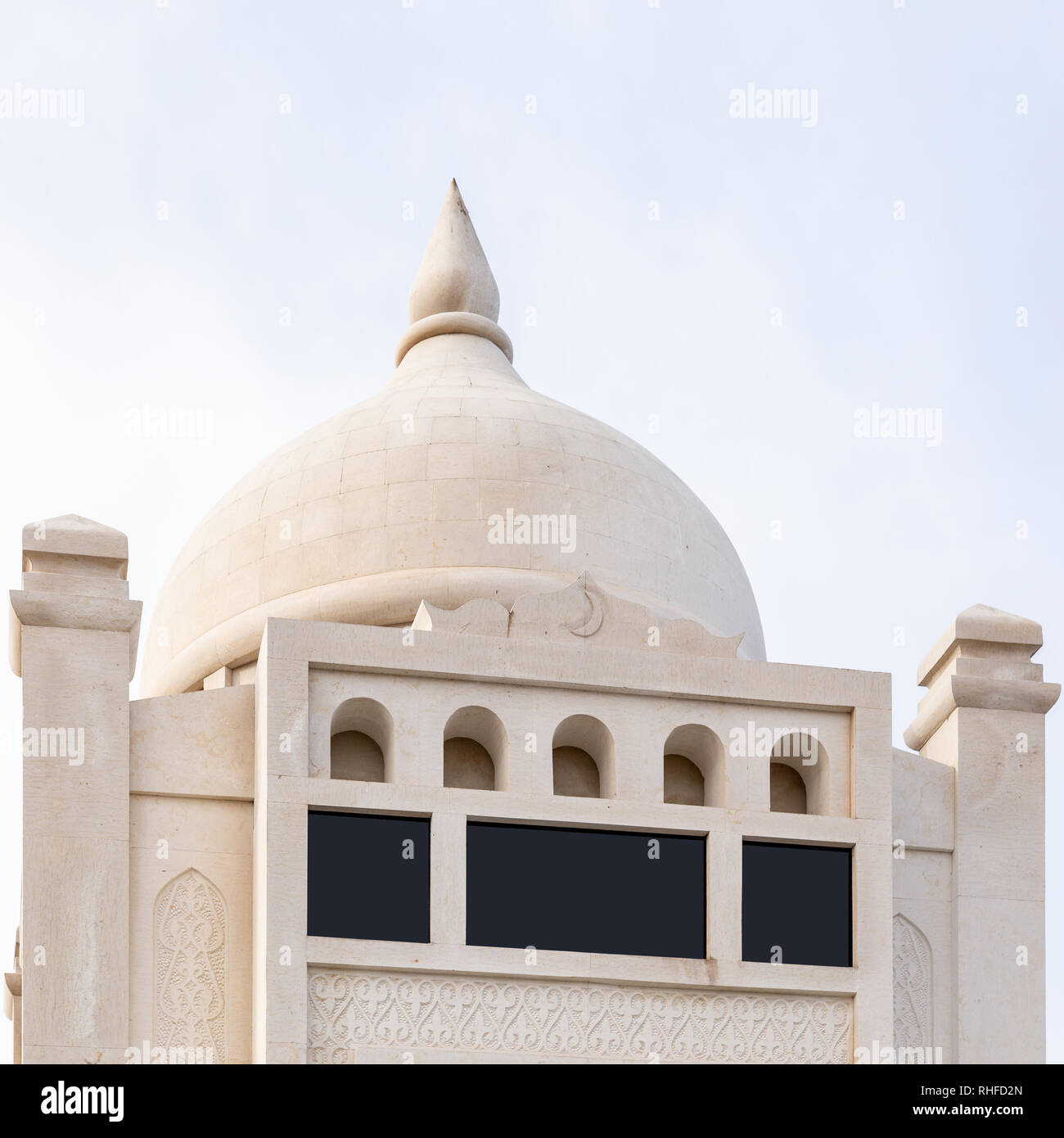 Fragment of an ancient Muslim mosque of white stone Stock Photo - Alamy