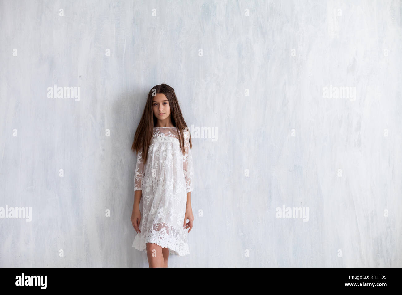 fashion girl 12 years old in a white dress Stock Photo - Alamy