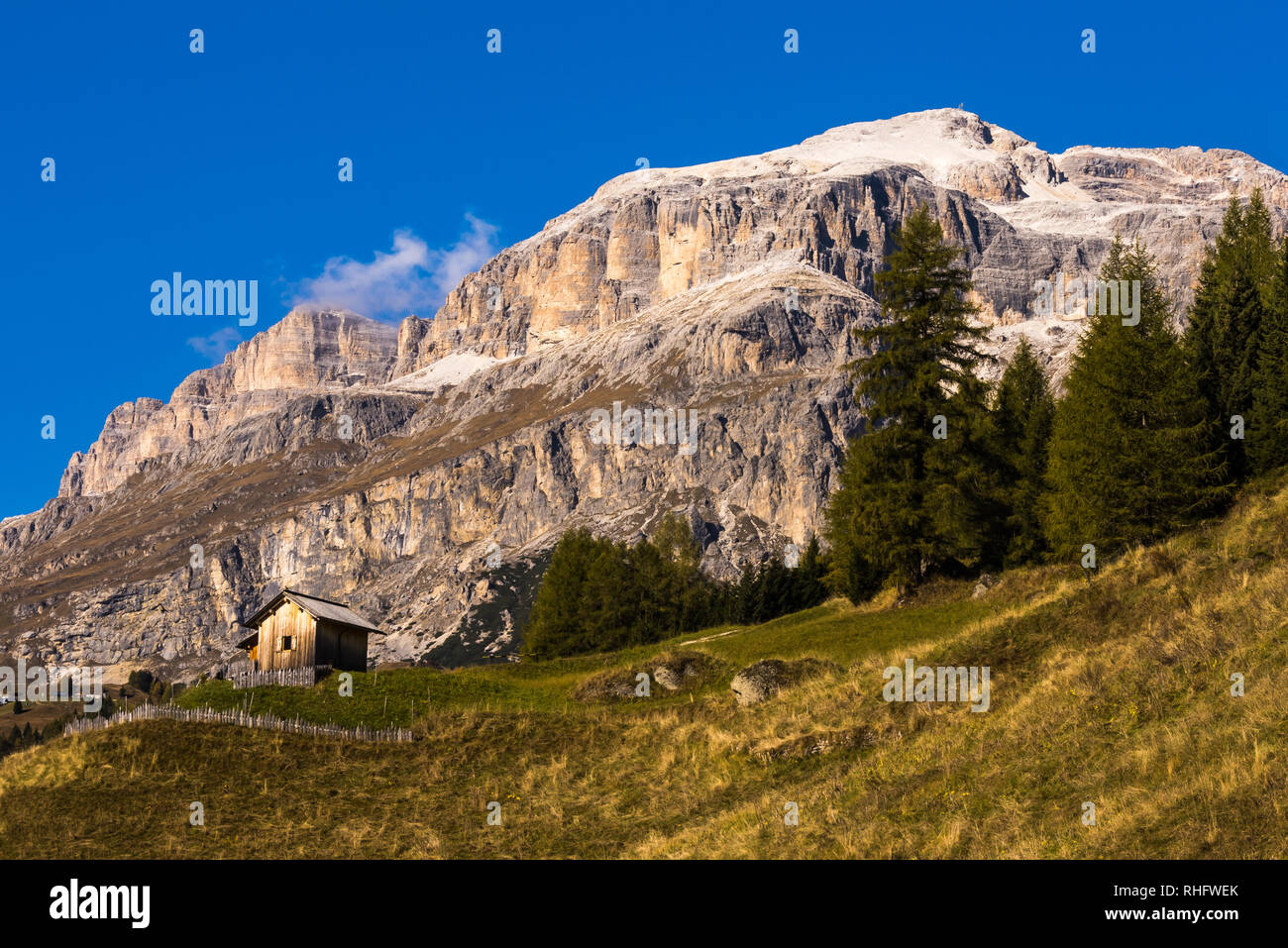 Alpine meadows with mountain hut in the autumnal Dolomites, Alps, Italy ...