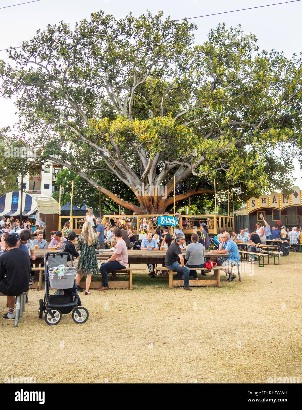 People sitting and eating and drinking at Fringe World Festival Russell ...