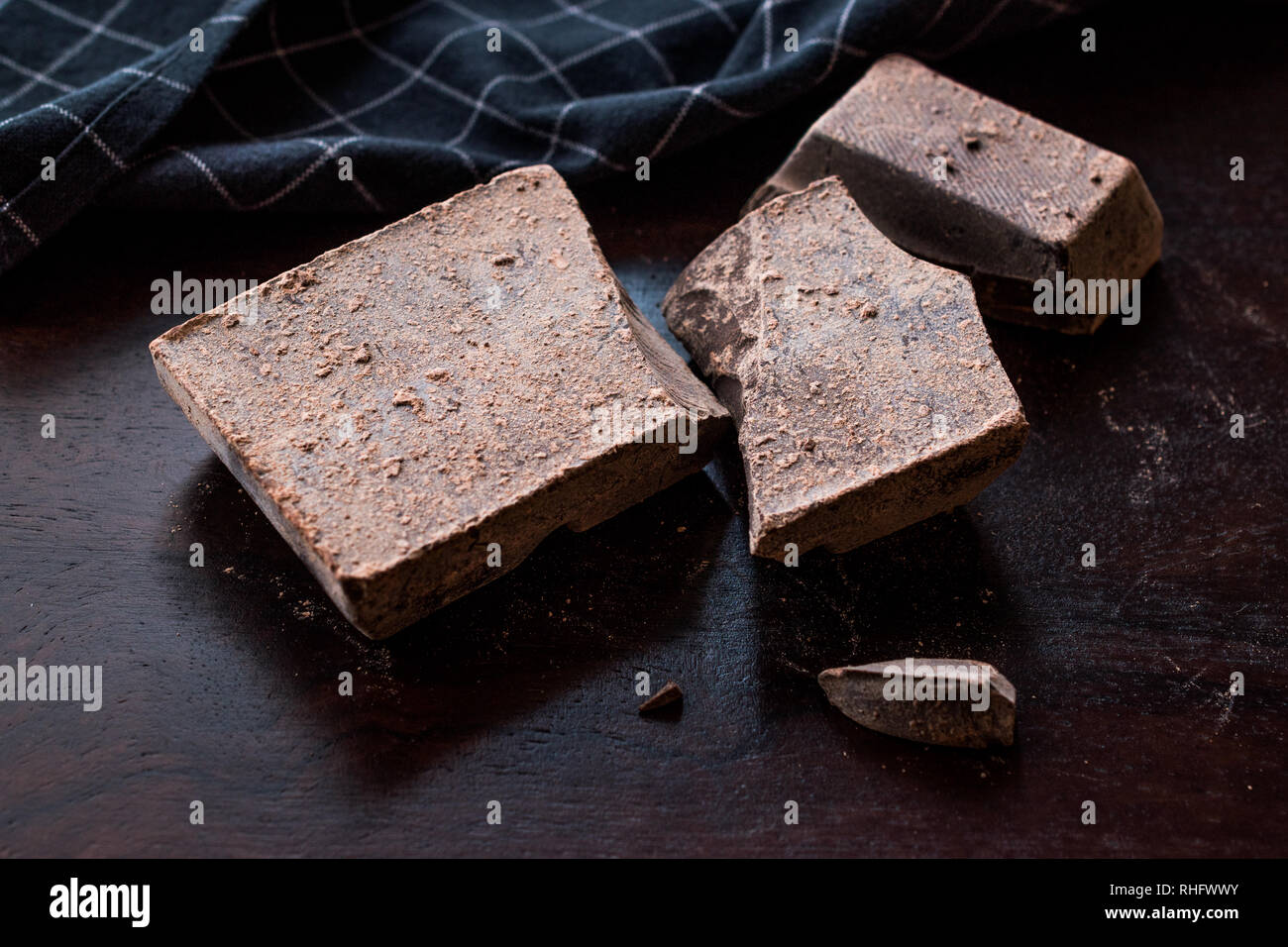 Couverture Bitter Chocolate Pieces on Dark Wooden Surface. Organic Food ...