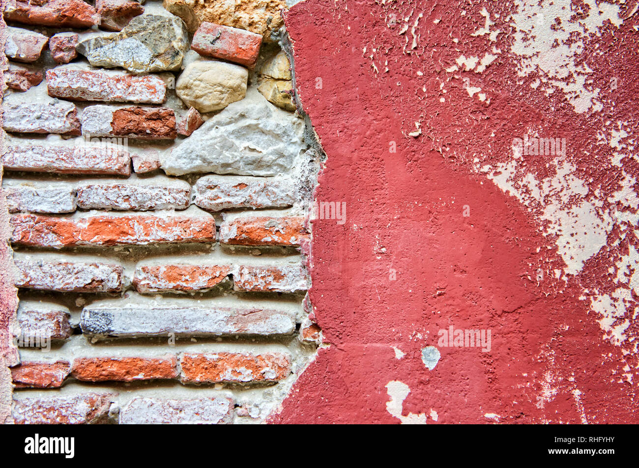 Old red brick wall damaged background Stock Photo - Alamy