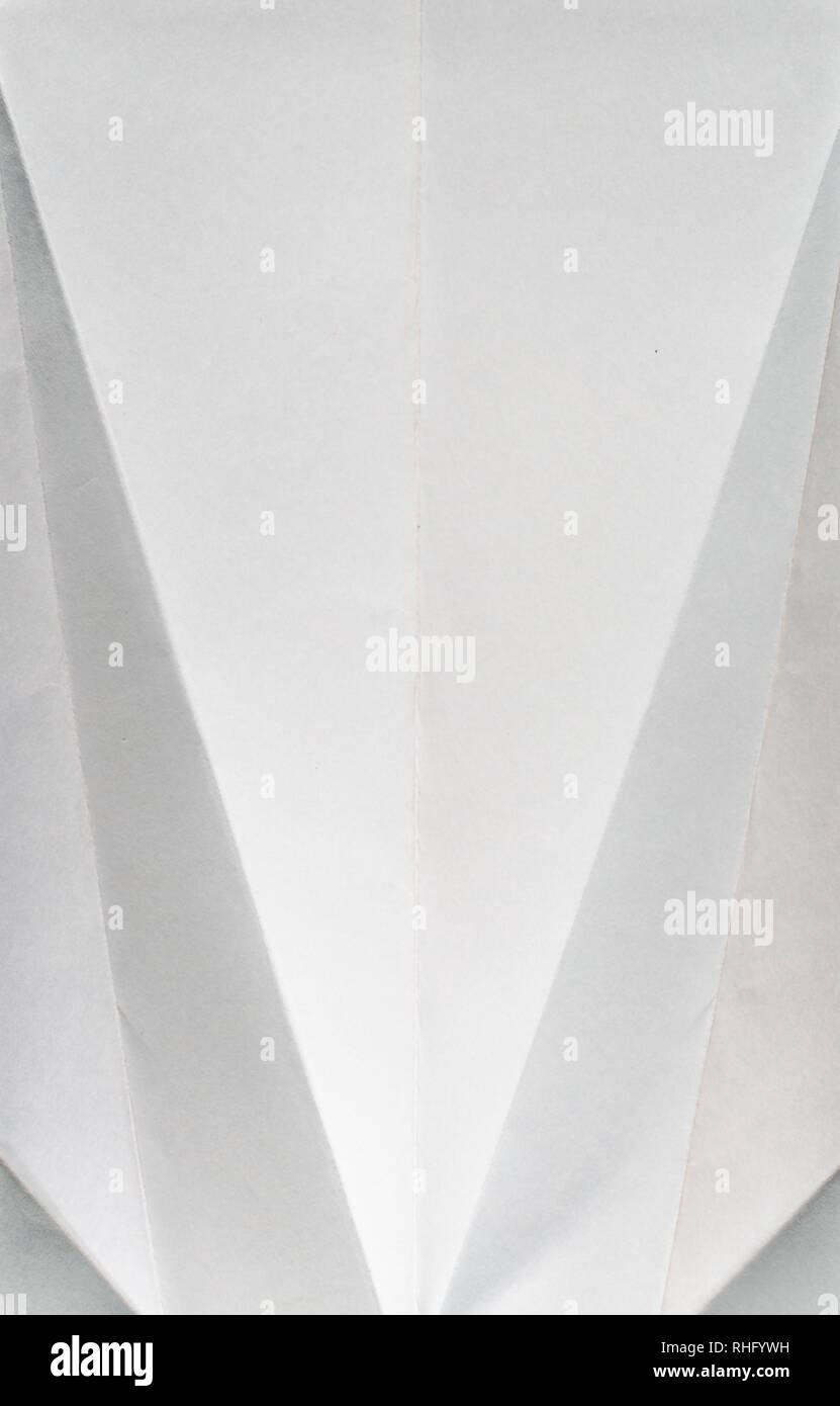Folded white colour paper. Pastel tones. Hard natural light. Folds and ...