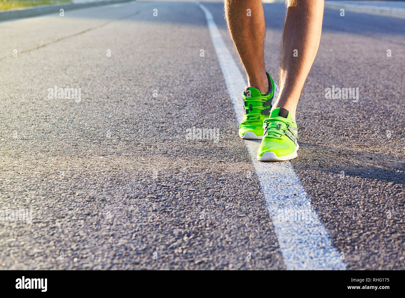 Runner man feet running on road closeup on shoe. Male fitness athlete ...