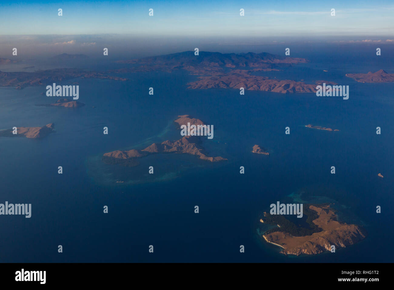 Aerial view of the several rugged and arid south pacific islands in ...