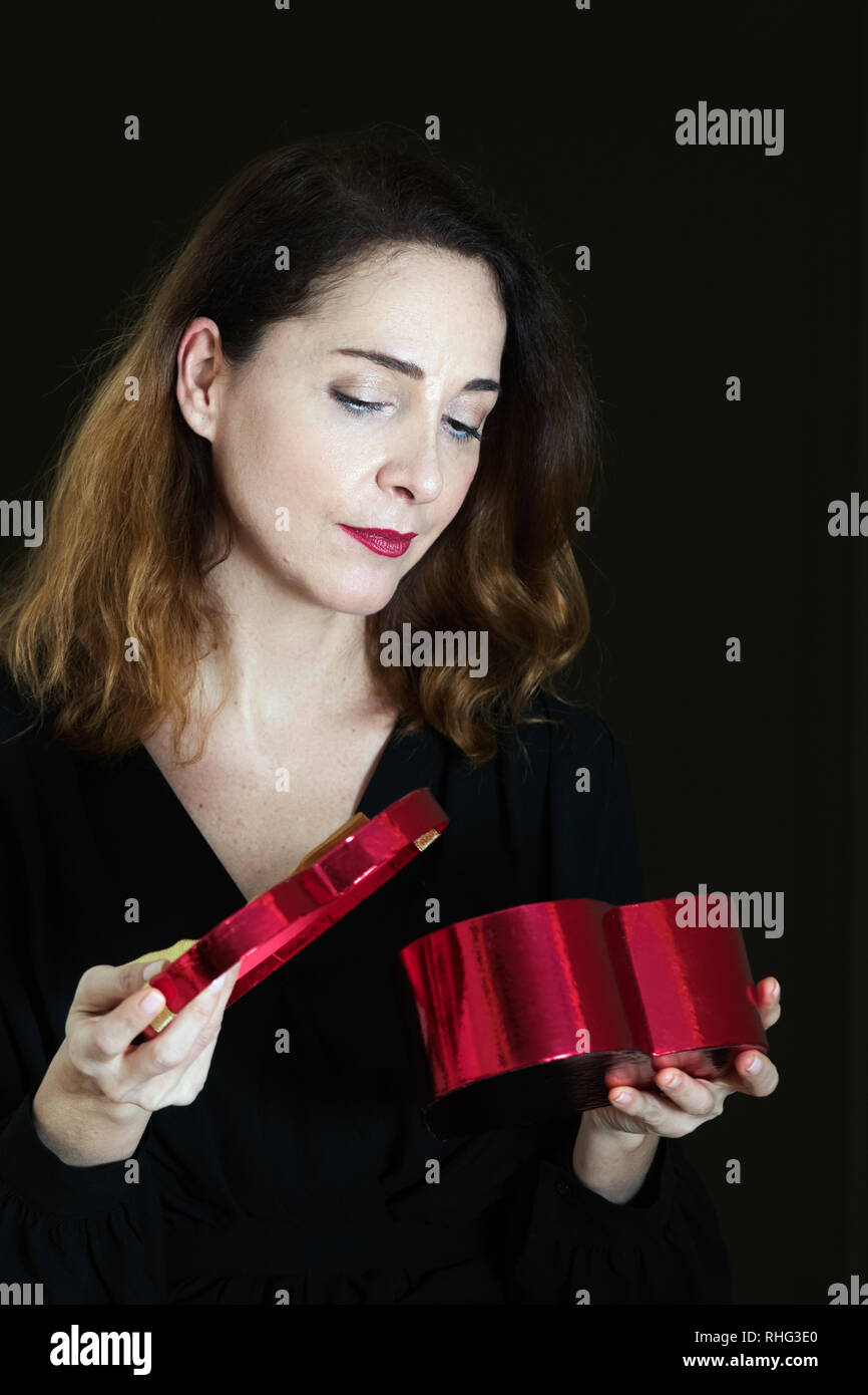 Opening a present a gift hi-res stock photography and images - Alamy