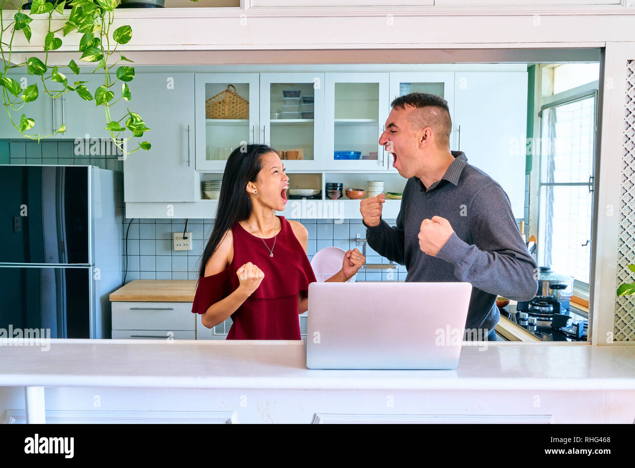 Lovely couple posing - arguing each other Stock Photo - Alamy