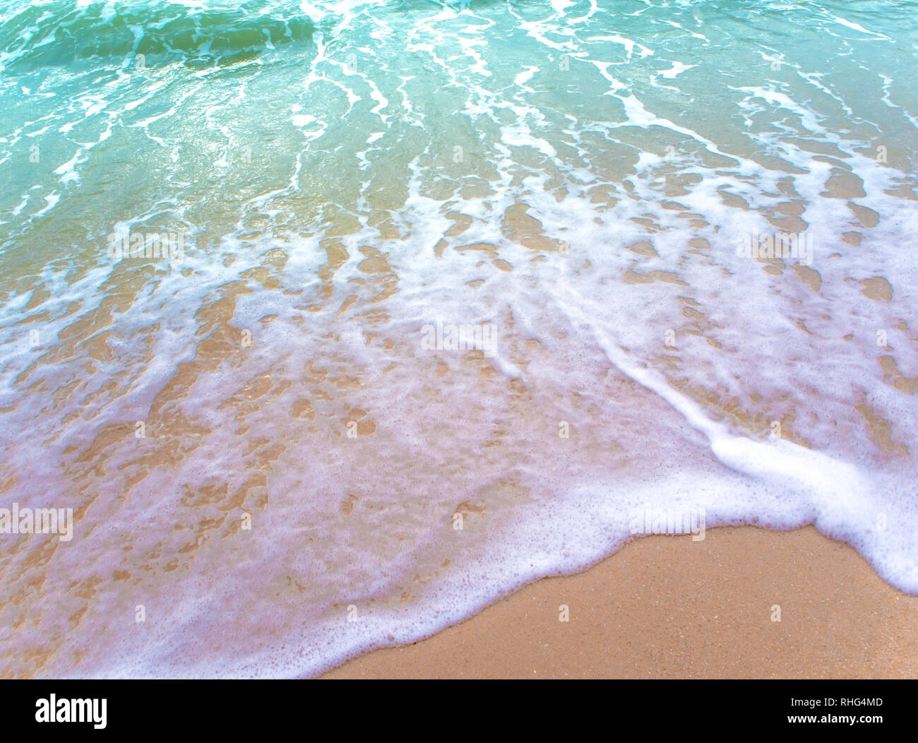 Bubble of Sea wave on the beach Stock Photo - Alamy