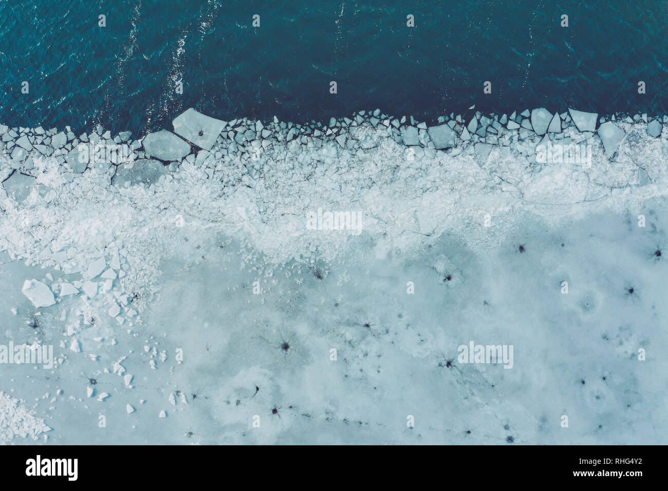 Glacier Lagoon with icebergs from above. Aerial View. Cracked Ice from ...