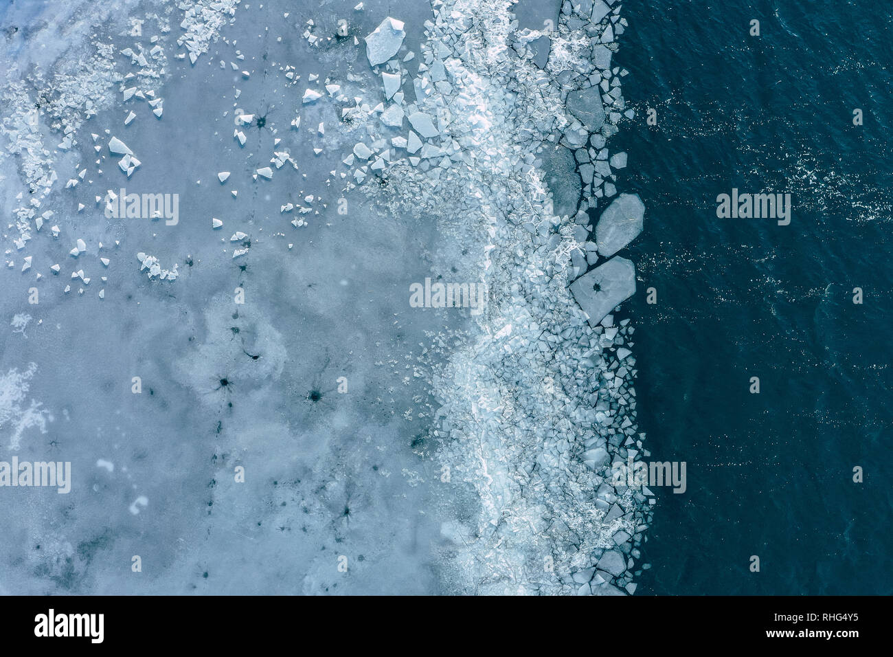 Glacier Lagoon with icebergs from above. Aerial View. Cracked Ice from ...
