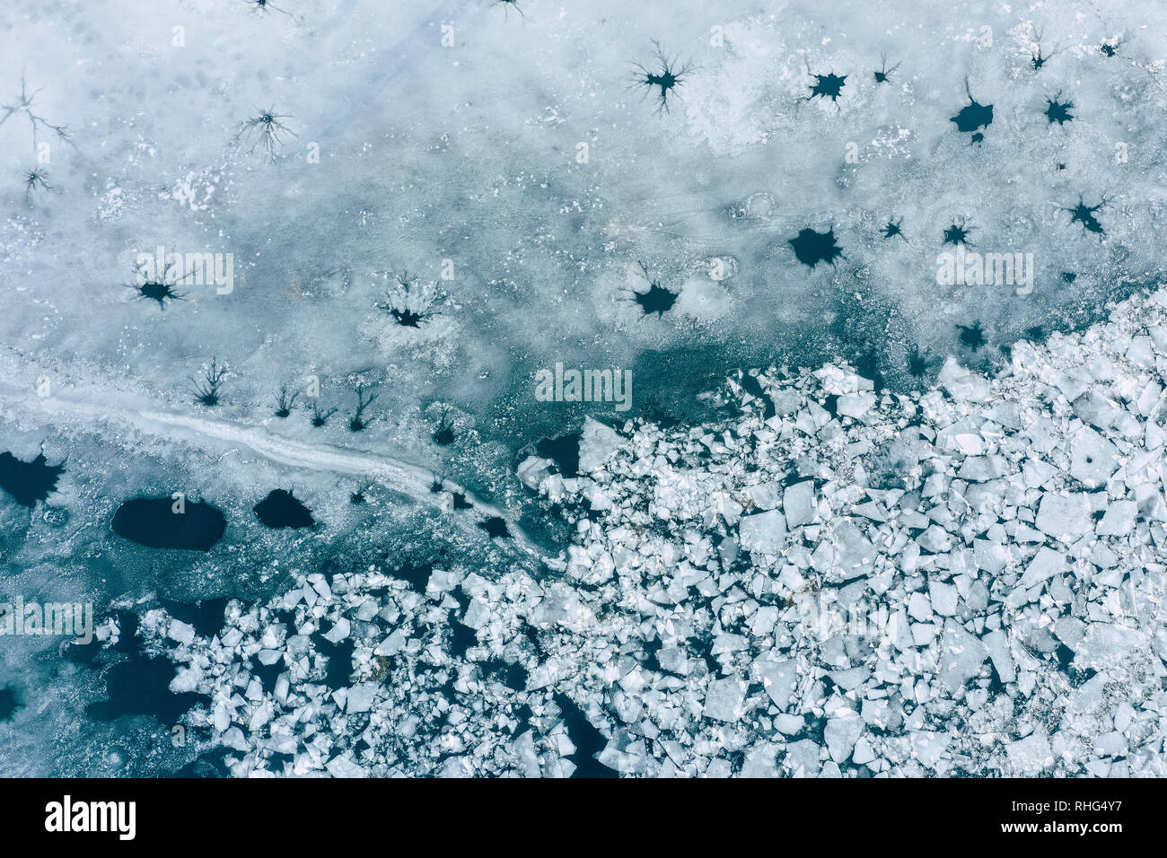 Glacier Lagoon with icebergs from above. Aerial View. Cracked Ice from ...