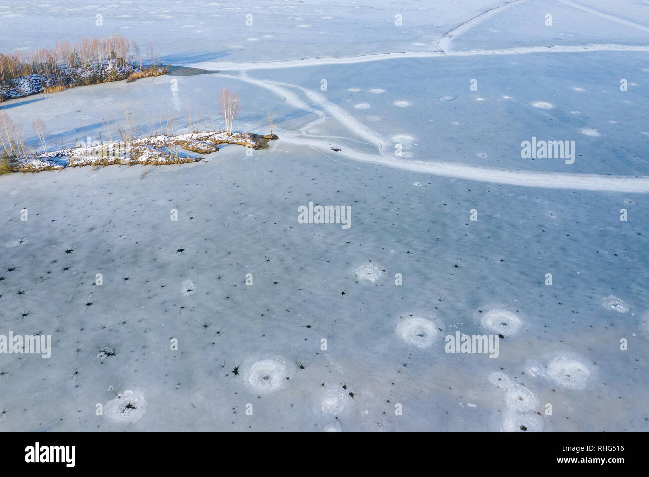 Aerial view of frozen lake. Winter scenery. Landscape photo captured ...