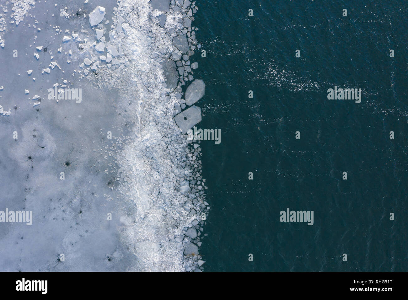 Glacier Lagoon with icebergs from above. Aerial View. Cracked Ice from ...