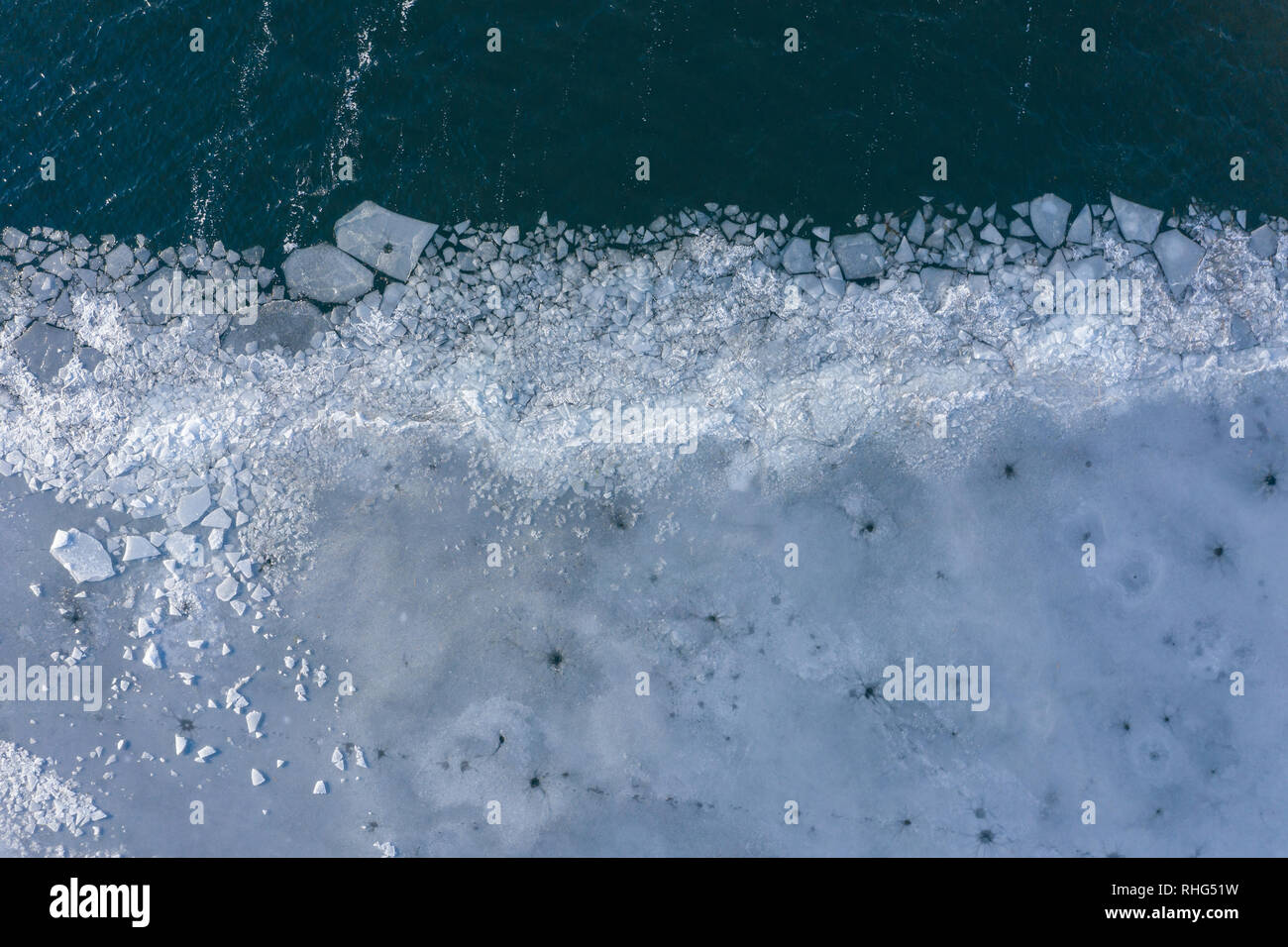 Glacier Lagoon with icebergs from above. Aerial View. Cracked Ice from ...