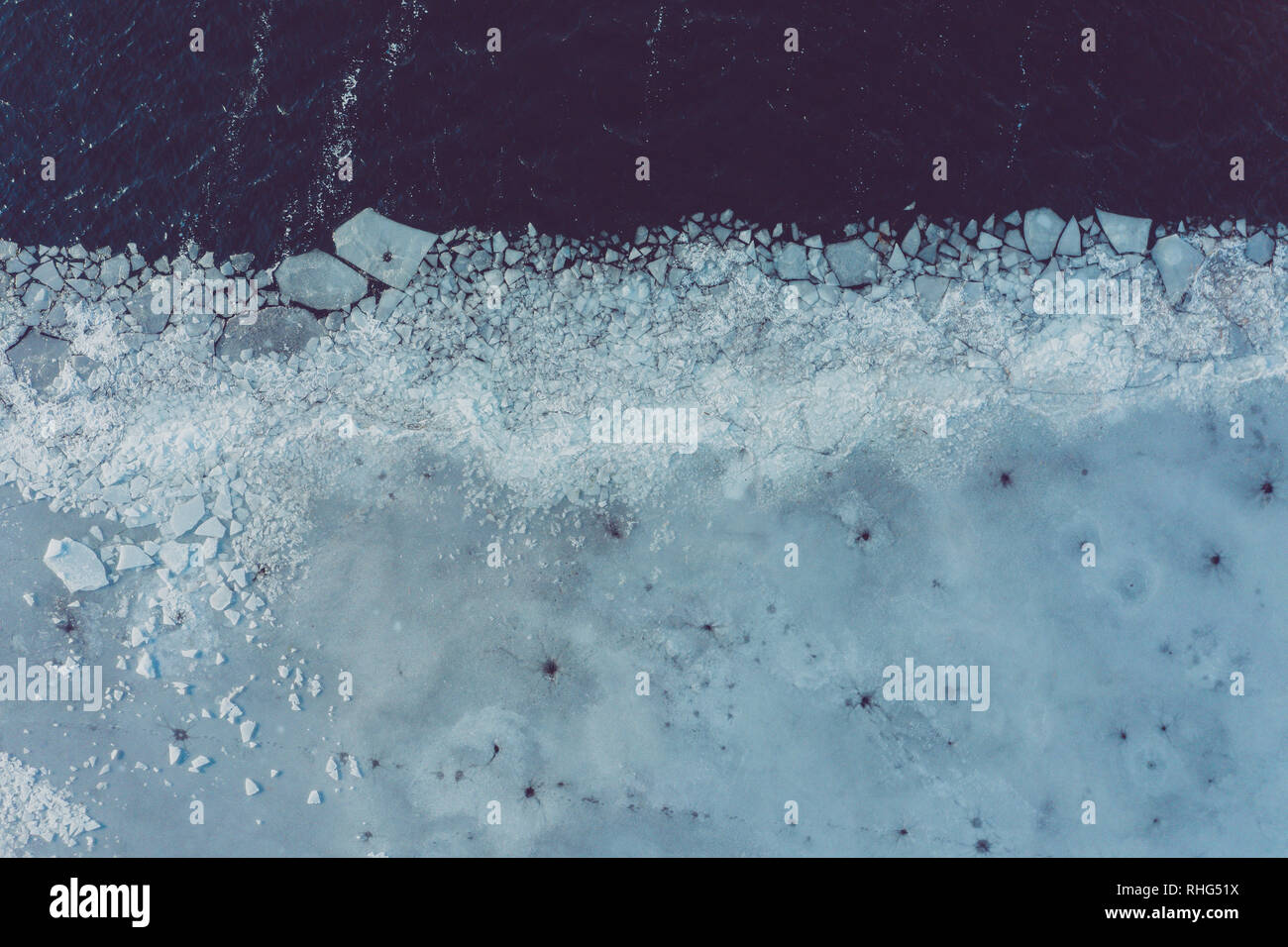 Glacier Lagoon with icebergs from above. Aerial View. Cracked Ice from ...