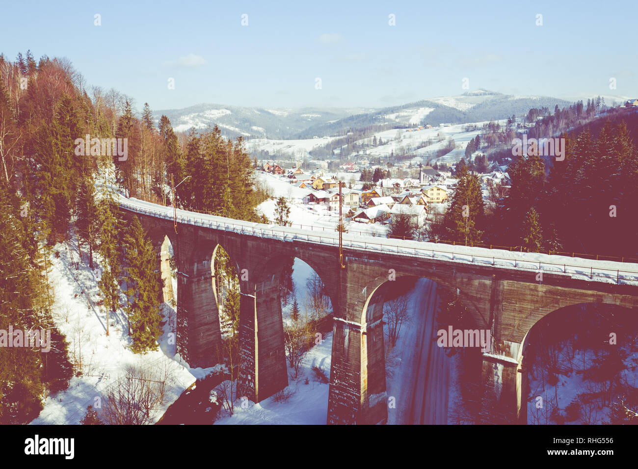 Winter scenery in Silesian Beskids mountains. Railwai viaduct in Wisla ...
