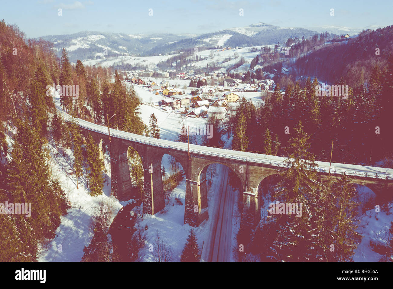 Winter scenery in Silesian Beskids mountains. Railwai viaduct in Wisla ...
