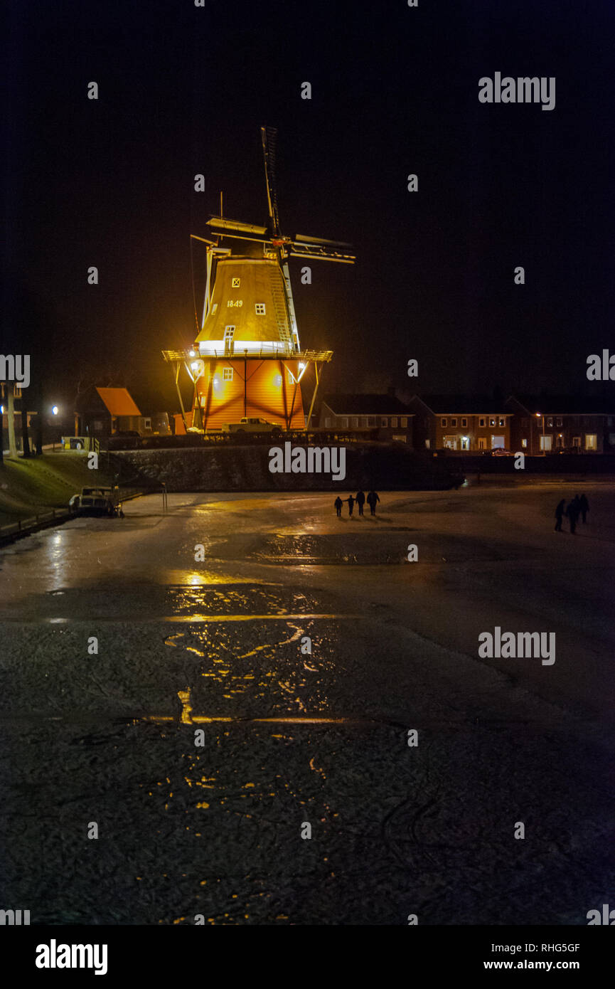 Windmill at night Stock Photo - Alamy