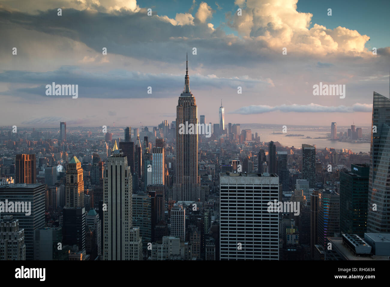 Pretty sunset Empire State Building seen from Top of the Rock at Rockefeller Center. 350 Fifth ...