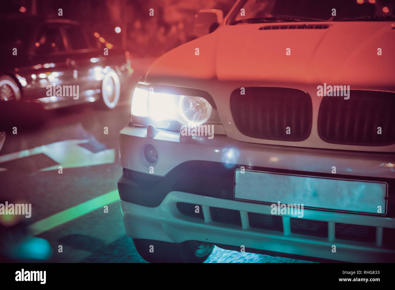 Night view of the cars. Road in the city at the night with yellow and ...