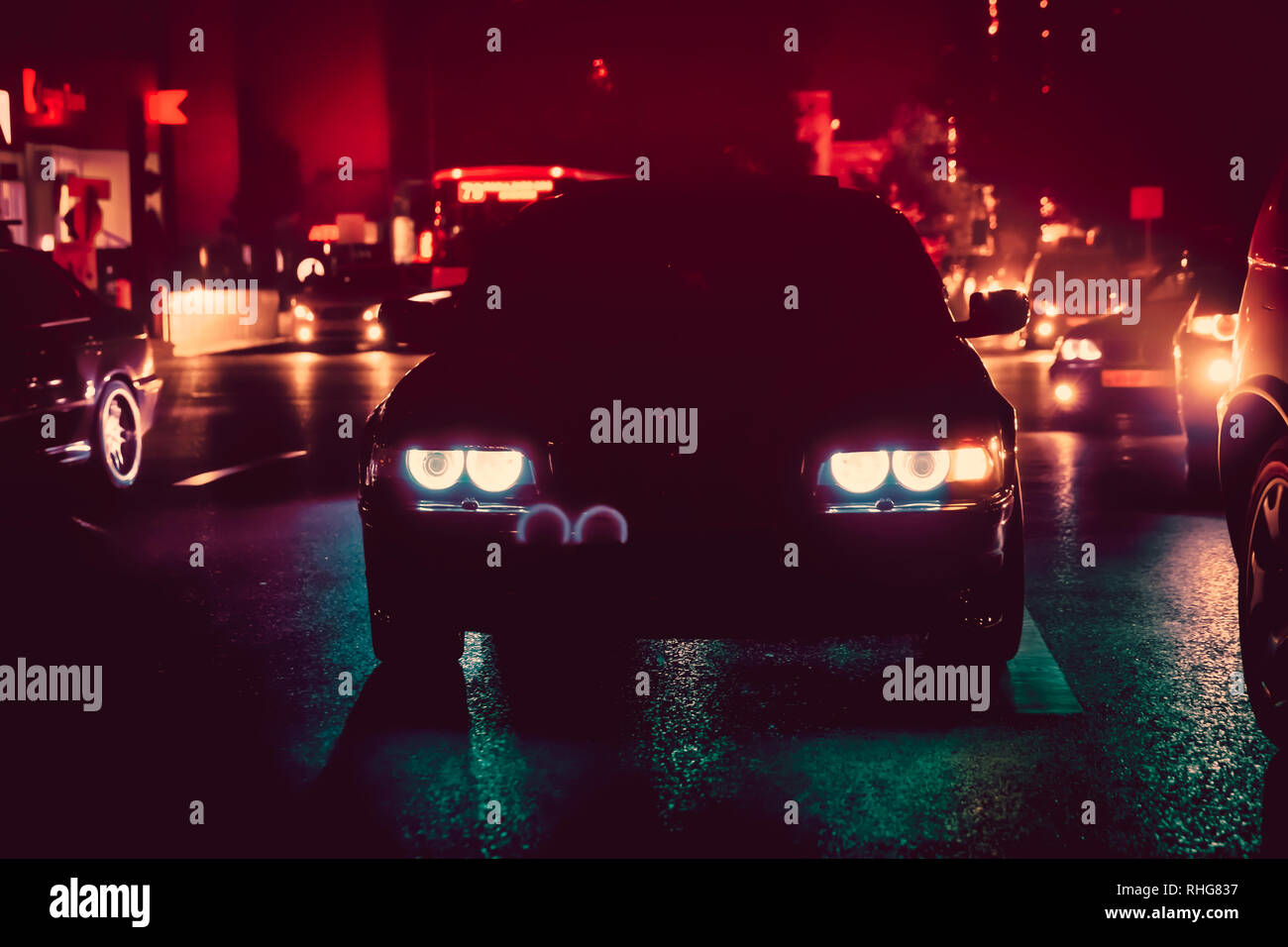 Night view of the cars. Road in the city at the night with yellow and ...