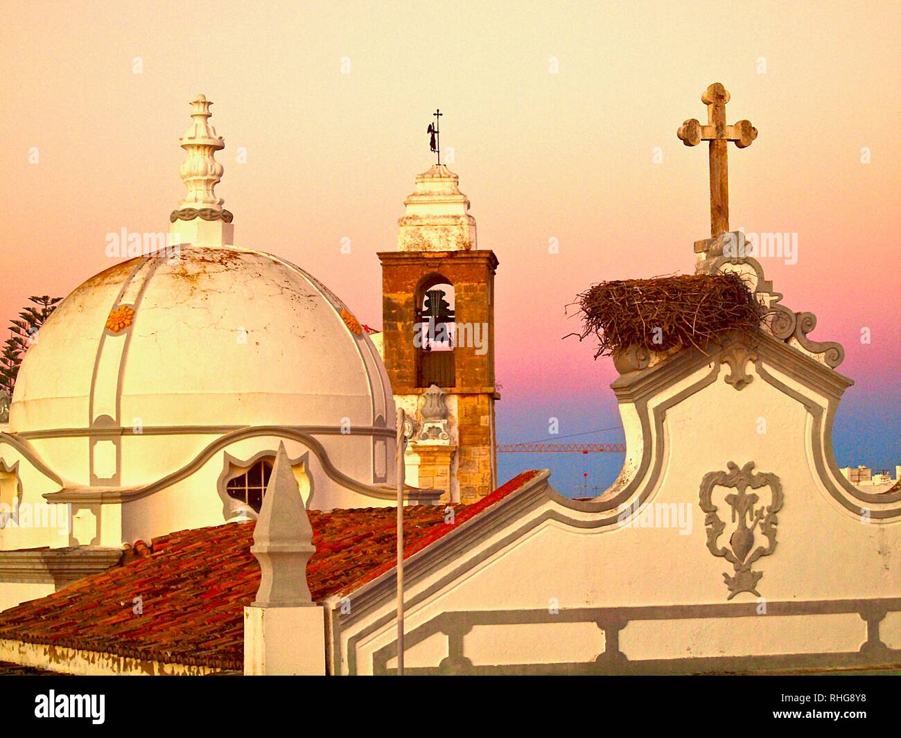 City church of Olhao in Portugal in the evening during sunset Stock ...