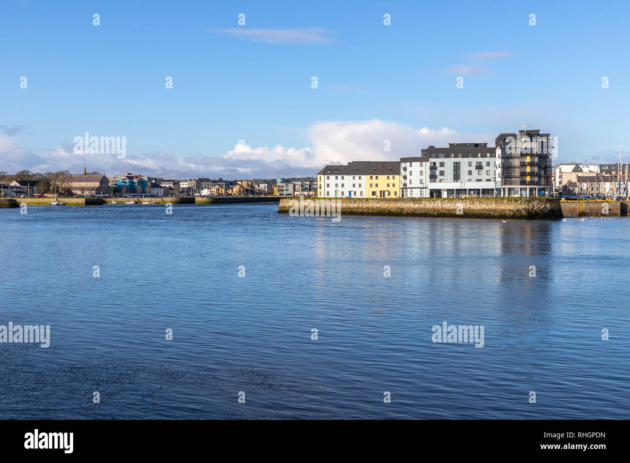 Corrib river and city buildings with reflection, Galway, Ireland Stock ...